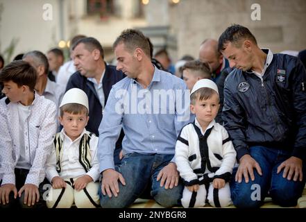 Kosovar children attend Eid al-Adha prayers outside Sultan Mehmet Fatih ...