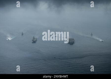 230215-N-ZQ263-1189 SOUTH CHINA SEA (Feb. 15, 2023) Ships and aircraft ...