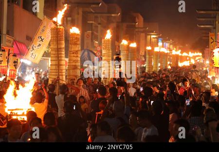 Giant torches, each standing about three meters tall and weighing 200 ...