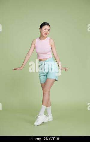 Lovely slim girl posing with sincere smile Stock Photo - Alamy