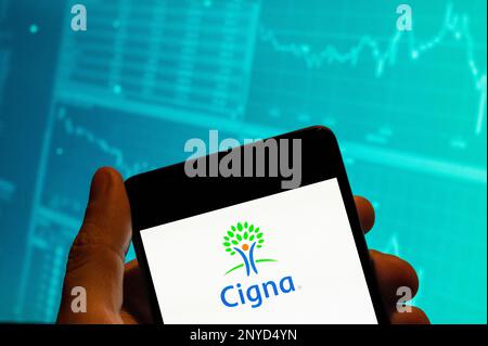 In this photo illustration, the Cigna Healthcare logo is displayed on a ...