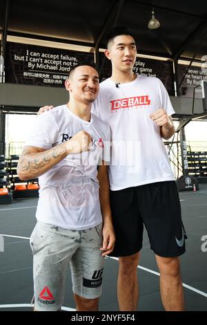 American mixed martial artist Max Holloway, left, the UFC Featherweight ...