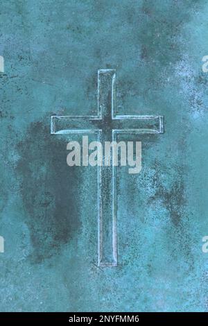 A simple typical cross embossed on a copper metal wall Stock Photo - Alamy