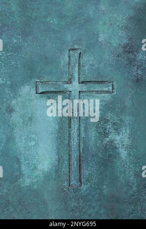 A simple typical cross embossed on a copper metal wall in a color film ...