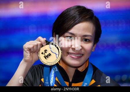 Cheong Jun Hoong of Malaysia poses with her gold medal after winning ...