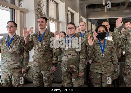 Inductees rise for the senior noncommissioned officer creed during a ...