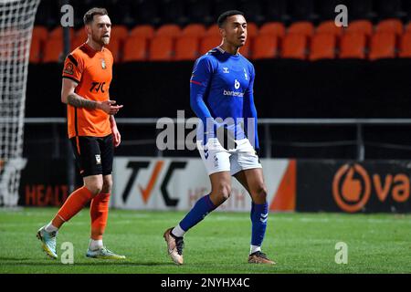 Alex Reid of Oldham Athletic Association Football Club tussles with ...