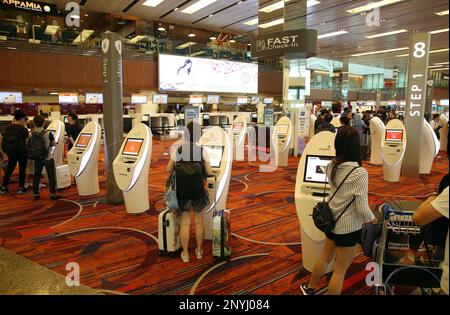 Self service baggage drop with automated machines at Heathrow Airport ...