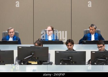 Presiding Judge Marc Perrin de Brichambaut opens the court session ...