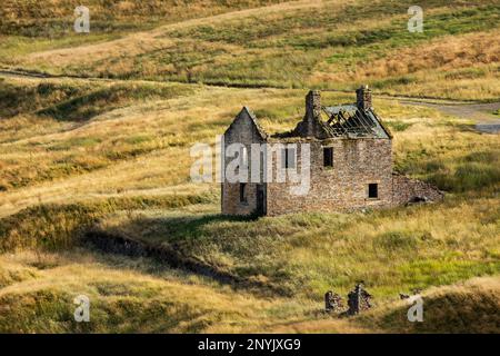 Abandoned buildings and winding gear at Groverake fluorspar and lead ...
