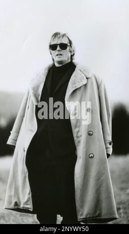 English film director Franc Roddam and actor Billy Wirth on the set of ...