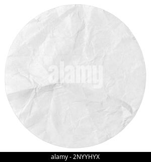 Blank white circle shape label isolated on black background. Crumpled ...