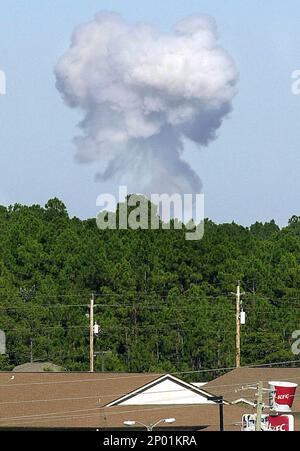 A U.S. Air Force Massive Ordnance Air Blast (MOAB) bomb is prepared for ...