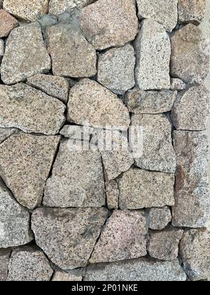 dirty limestone brick wall with black spots Stock Photo - Alamy