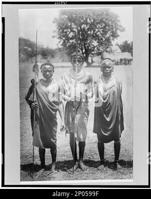 Three Nandi warriors full-length portrait, standing, facing front ...