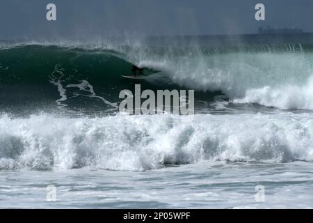 Tube riding on large waves surfed at Winkipop near Bells Beach Torquay ...