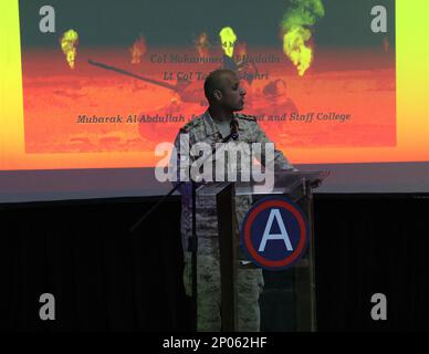 Lt. Col. Talal Bushehri presents the lecture. To commemorate the 32nd ...