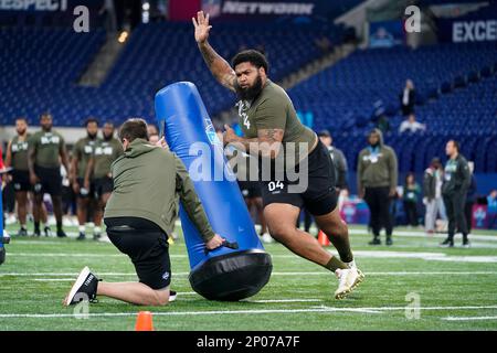 Coastal Carolina defensive lineman Jerrod Clark runs the 40-yard dash ...