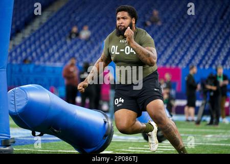 Coastal Carolina defensive lineman Jerrod Clark runs a drill at the NFL ...
