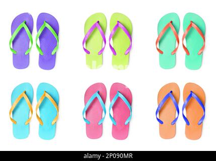 Set with different colorful flip flops on white background, top view ...