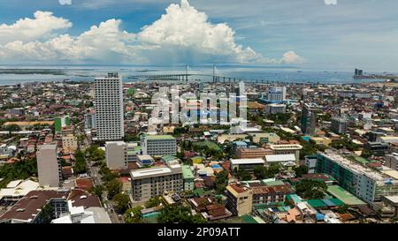 Top view of Cebu city with tall buildings. Cebu Cordova Link Expressway ...