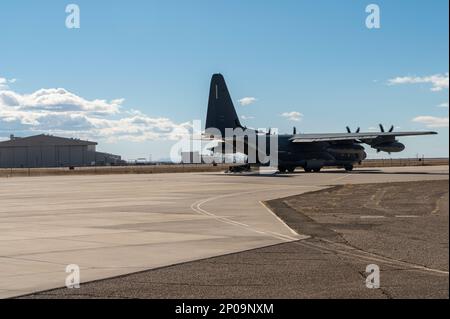 Loadmasters from the 415th Special Operations Squadron prepare to load ...