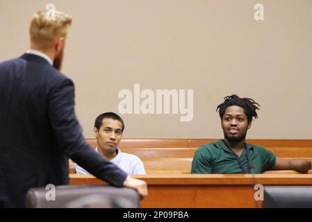 Lawyer David Lee Windecher speaks to a two young offenders, Luis Rangel ...