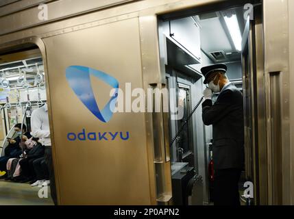 Odakyu line leaving Shinjuku station in Tokyo, Japan Stock Photo - Alamy