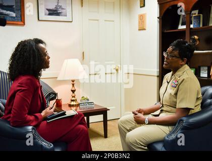 The first female commanding officer of Naval Station Norfolk salutes ...