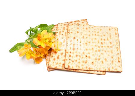 Jewish flatbread matza for Passover and beautiful carnation flowers on ...