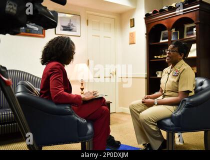 The first female commanding officer of Naval Station Norfolk salutes ...