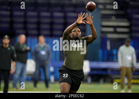 Mississippi State linebacker Tyrus Wheat runs a drill at the NFL ...