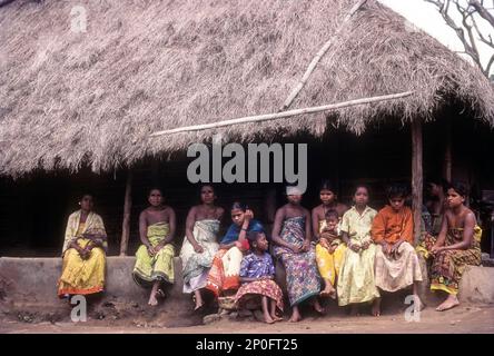 A group of Betta kurumba tribal people posing for the camera at ...