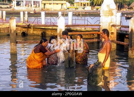 People worshipping Navagraha idols nine planetary deities made of ...