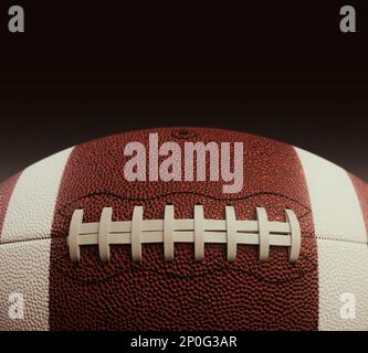 A generic unbranded american football ball on an isolated studio ...