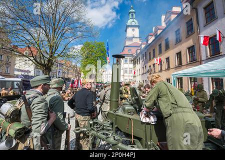 Reenactors at field kitchen, before reenactment of WW2 battle, City ...