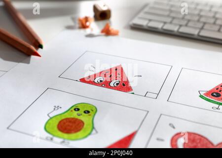 Storyboard with cartoon sketches at workplace. Pre-production process ...