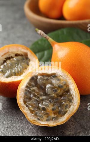 Delicious ripe granadillas on grey table, closeup Stock Photo - Alamy