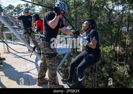 Recruits rappel from a tower during basic training at the Marine Corps ...