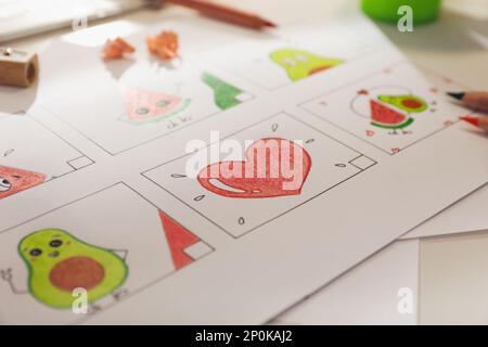 Storyboard with cartoon sketches at workplace. Pre-production process ...