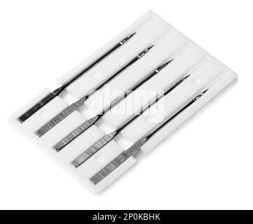 Set of sewing machine needles with package isolated on white Stock ...