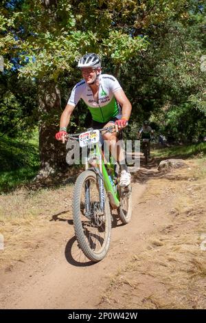 mountain biker on Cape Epic 2018 course with spectators in Cape Town ...