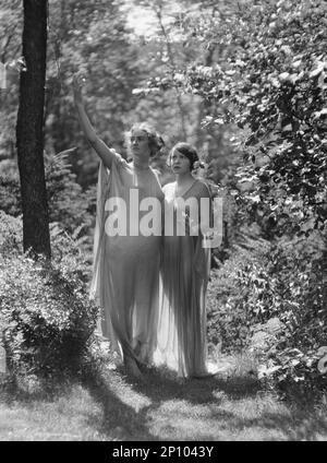 Egger, Gabrielle, Miss, and unidentified woman, standing outdoors ...