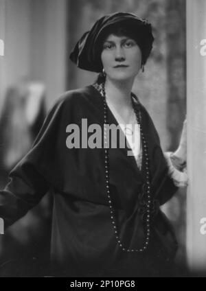 A black-and-white photograph of Frances Breese, a woman walking along ...