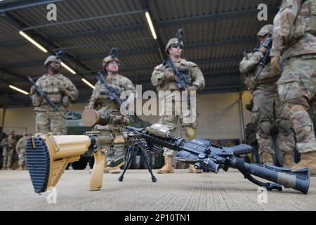 The photo displays an HK M110 Squad Designated Marksman Rifle, left ...