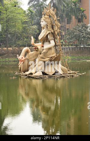Big sculpture of hindu devi saraswati in a lake in Dhaka University ...