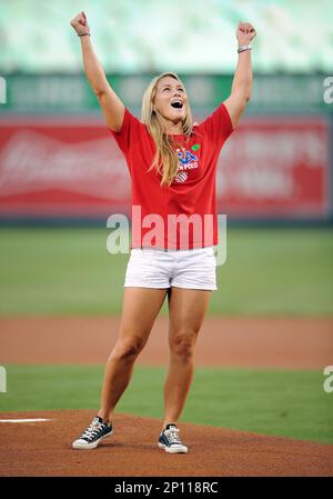 Water polo gold medalist Courtney Mathewson is greeted by friends and ...