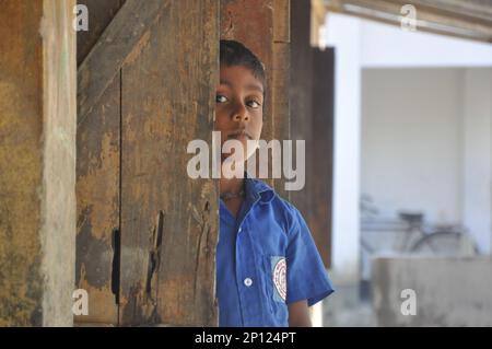 Picture of some under privileged poor innocent school boy Stock Photo ...