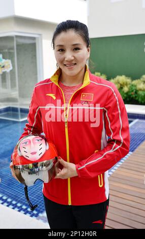 The bike helmet featuring elements from Peking Opera, worn by Chinese ...