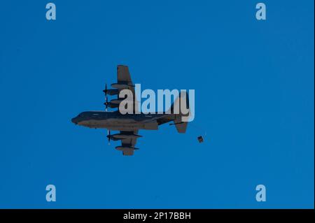 Loadmasters from the 415th Special Operations Squadron prepare to load ...